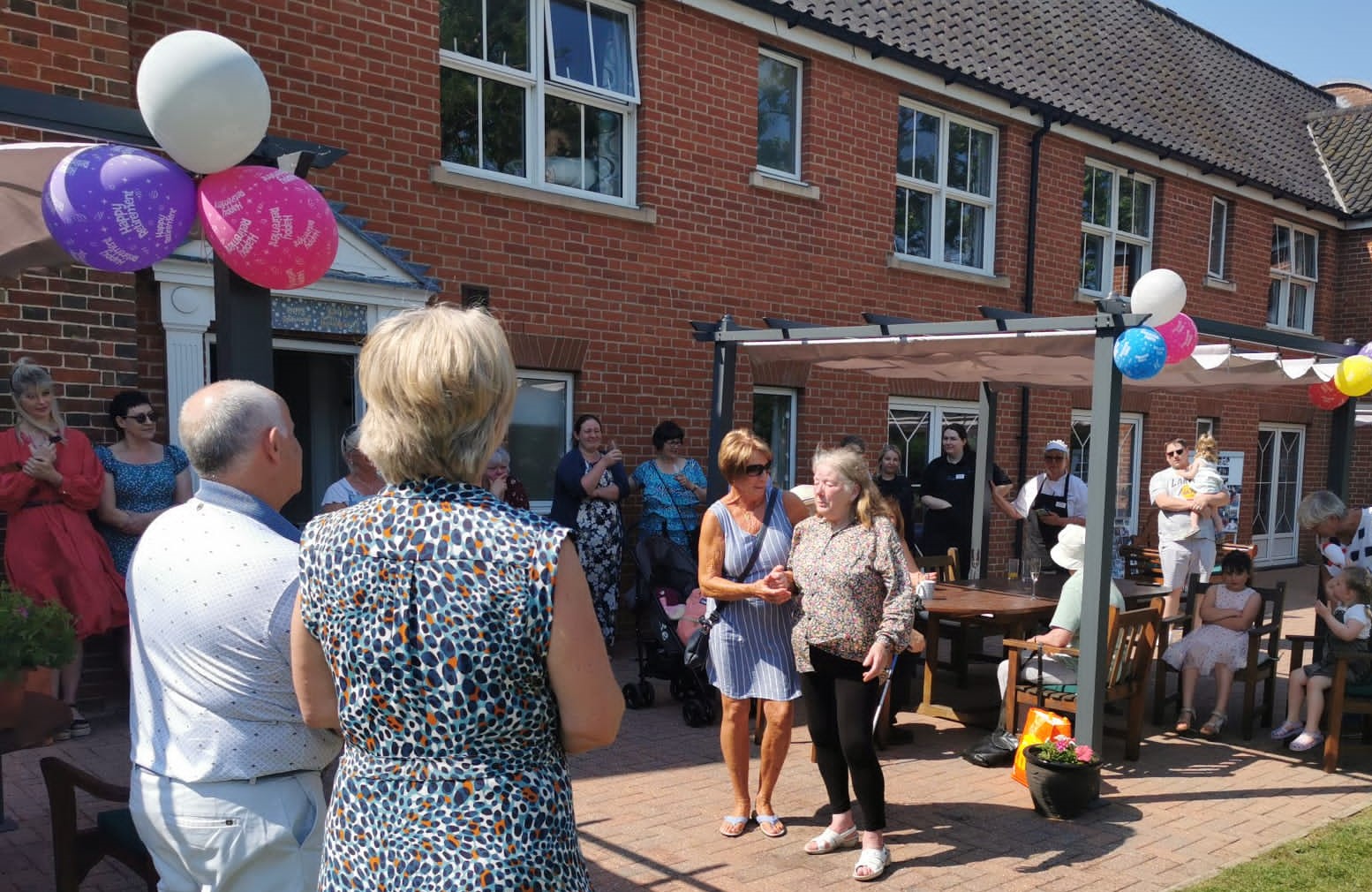 Staff at Saxlingham Hall celebrate 104 years' service | Healthcare Homes